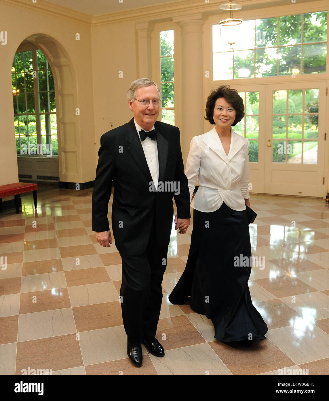 Senate Minority Leader Mitch McConnell, R-KY, and his wife Elaine Chao ...