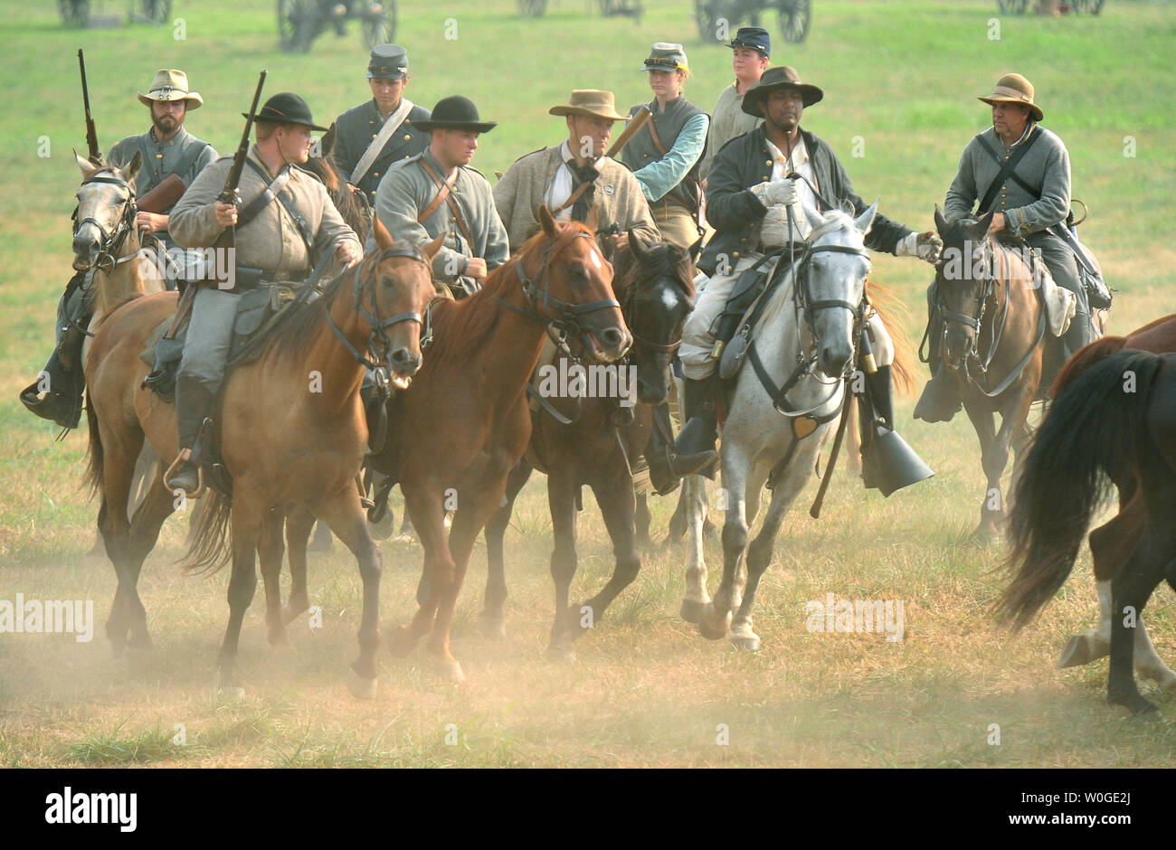 Confederate cavalry charge into battle during the reenactment of the ...