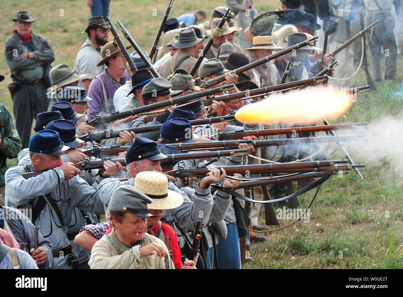 Confederate soldiers fire during the reenactment of the Battle of Bull ...