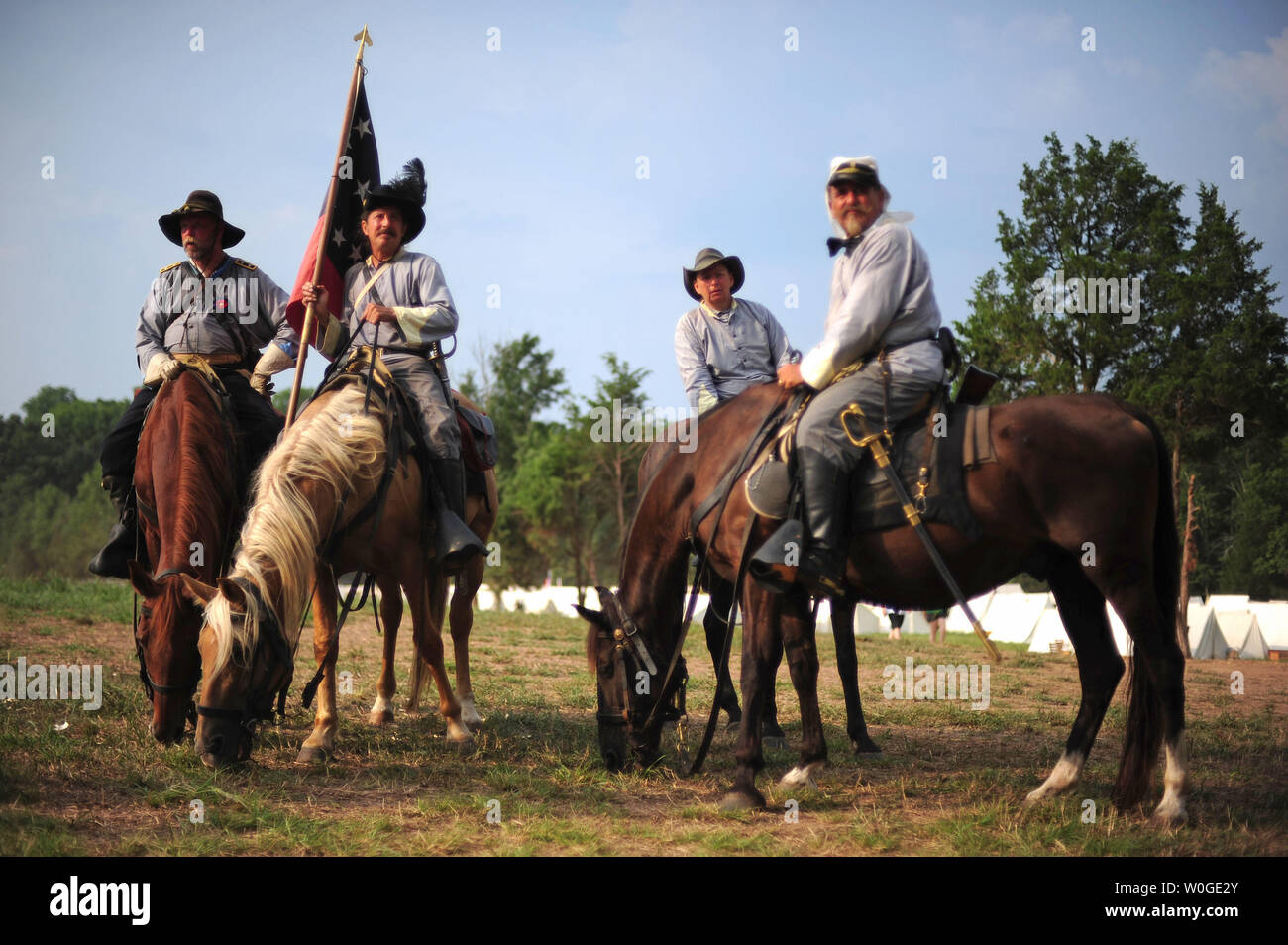 Confederate cavalry wait for the start of reenactment of the Battle of ...