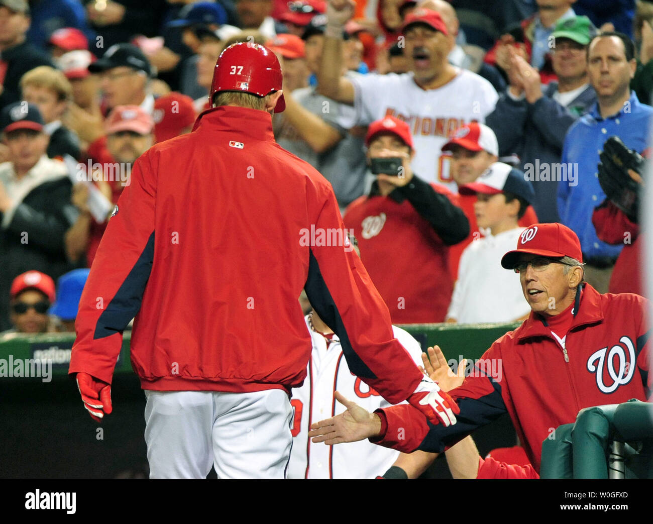 Washington Nationals pitcher Stephen Strasburg is congratulated by ...