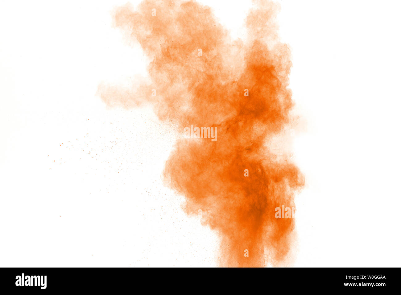Orange color powder explosion cloud on white background. Orange dust ...