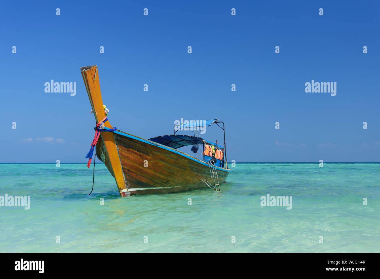 boat and beautiful blue ocean Stock Photo - Alamy