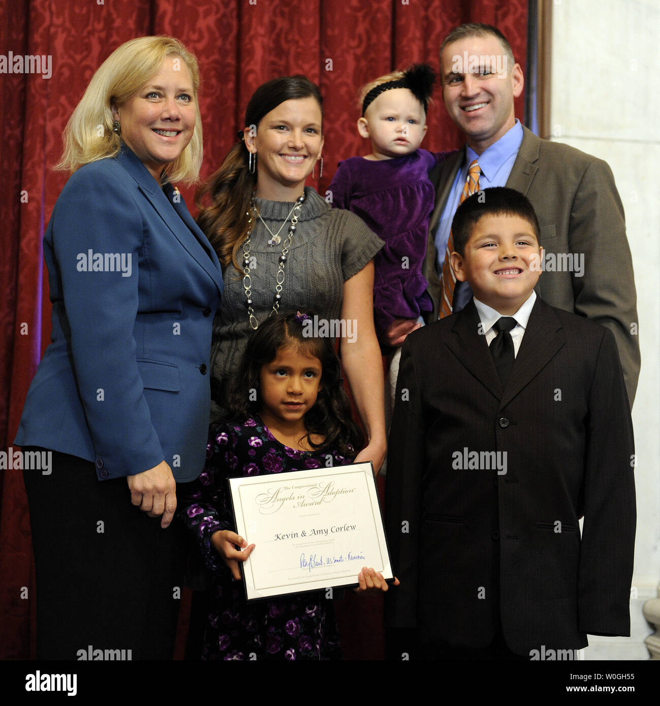 Sen. Mary Landrieu, D-LA, presents the Corlew family with an award ...