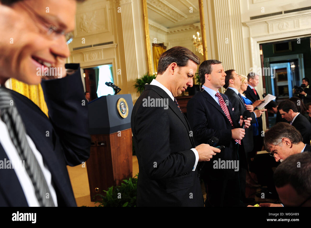Television reporters do live stand ups prior to President Barack Obama ...