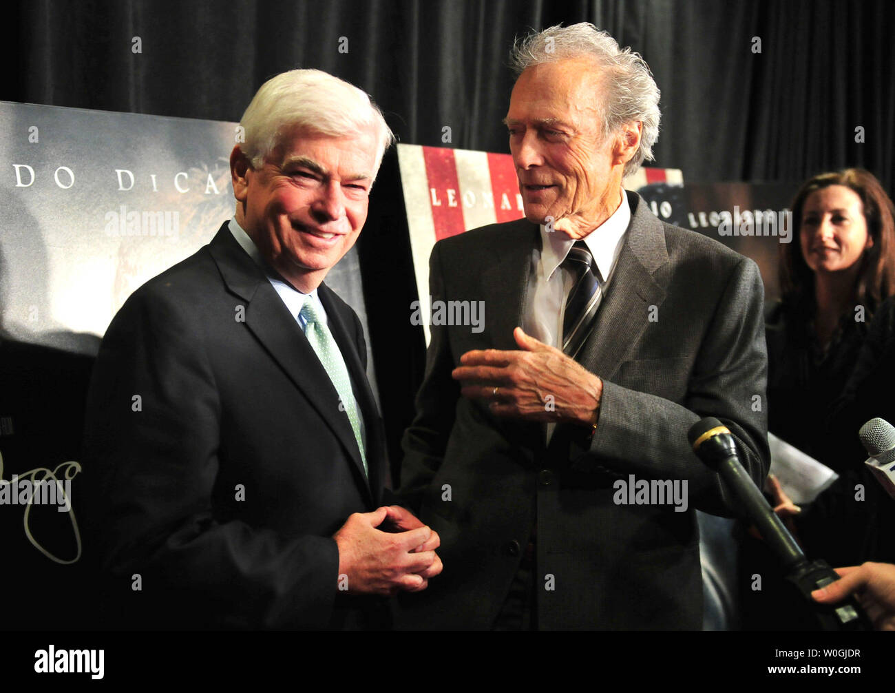 Director Clint Eastwood (R) talks to former Sen. Chris Dodd (D-CT) at ...