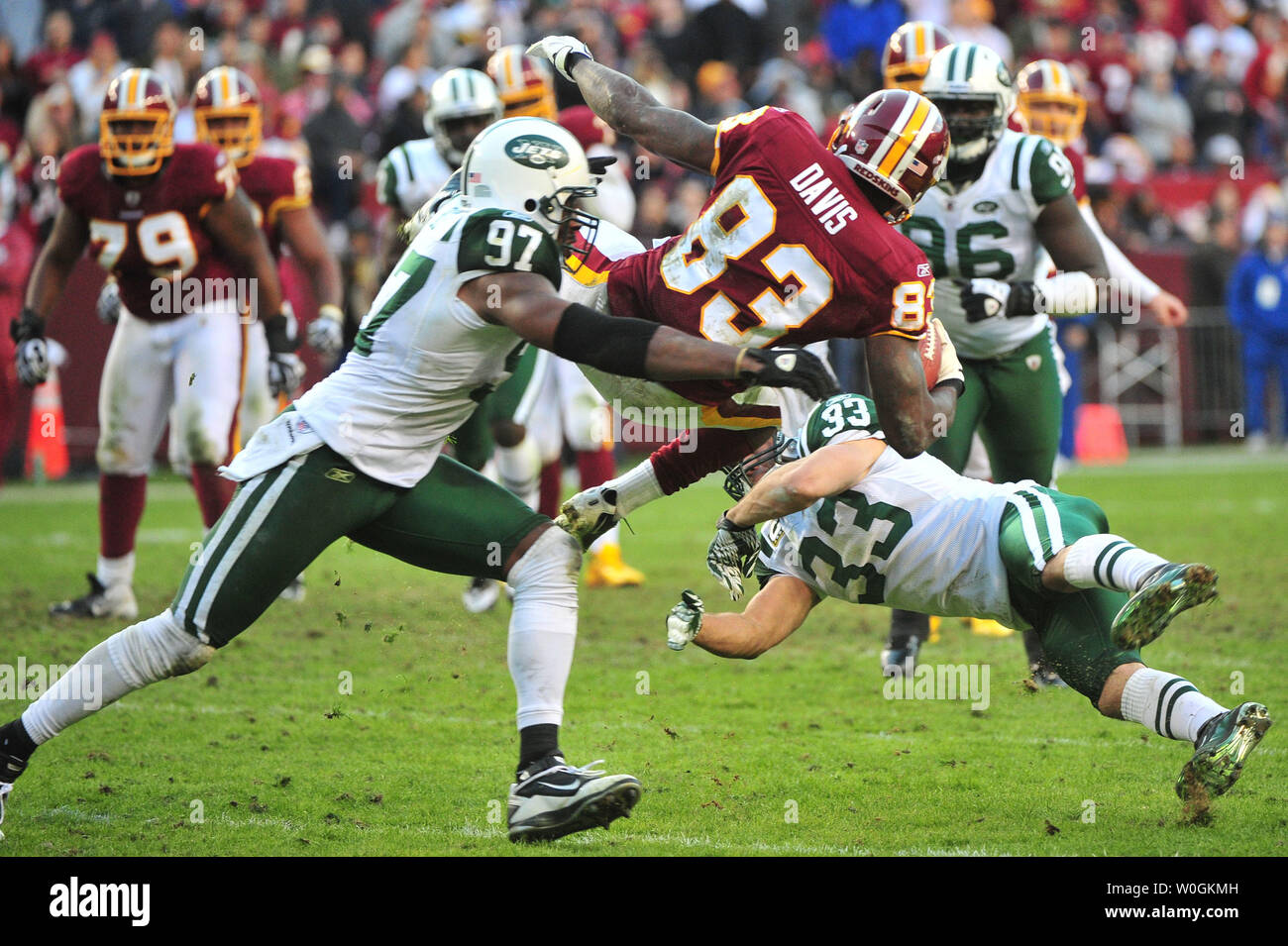 Washington Redskins tight end Fred Davis is sent air born as he is hit ...