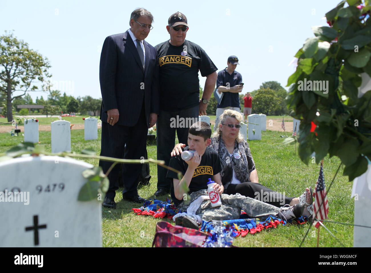 Secretary of Defense Leon Panetta visits the grave site of U.S. Army ...