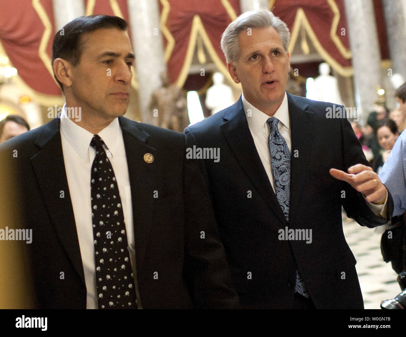 Rep. Kevin McCarthy (R-CA) (R) talks to Re. Darrell Issa (R-CA) after ...