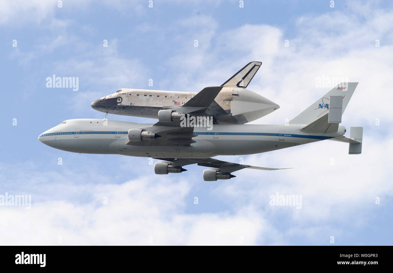The Space Shuttle Discovery atop the NASA Shuttle Carrier Aircraft, a ...