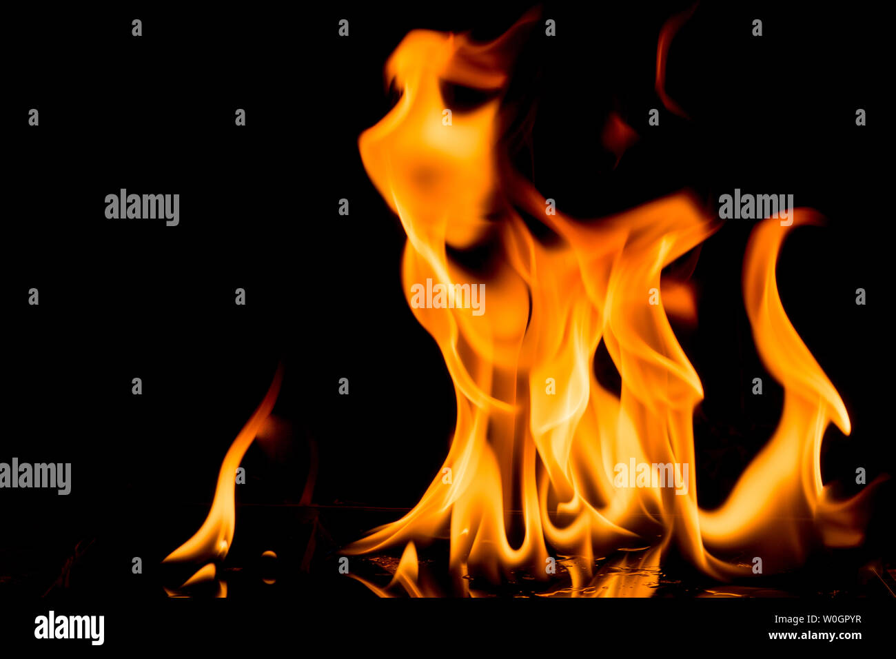 Nature Fire flames on black background. Freeze motion of Red-Yellow ...