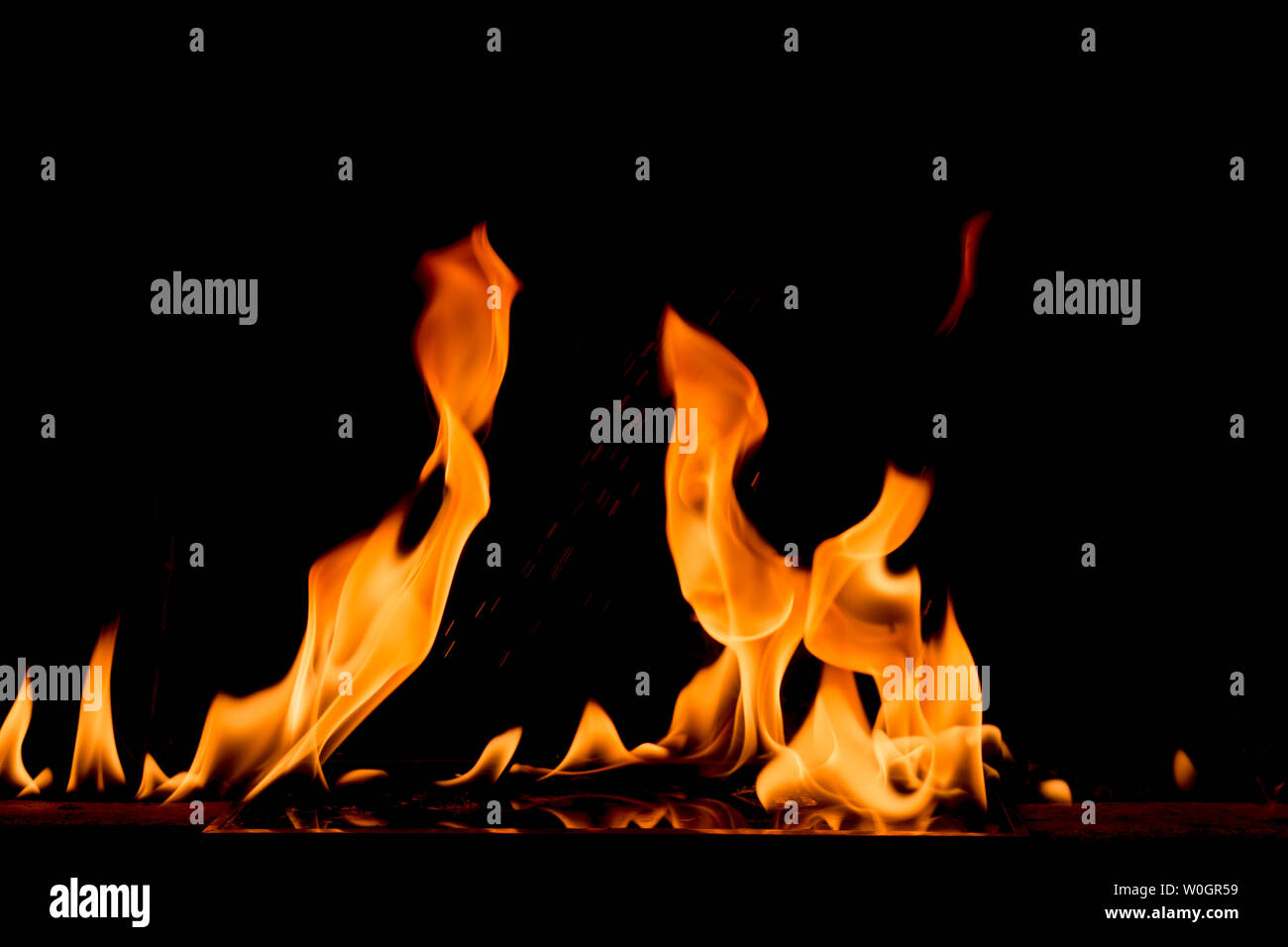 Nature Fire flames on black background. Freeze motion of Red-Yellow ...