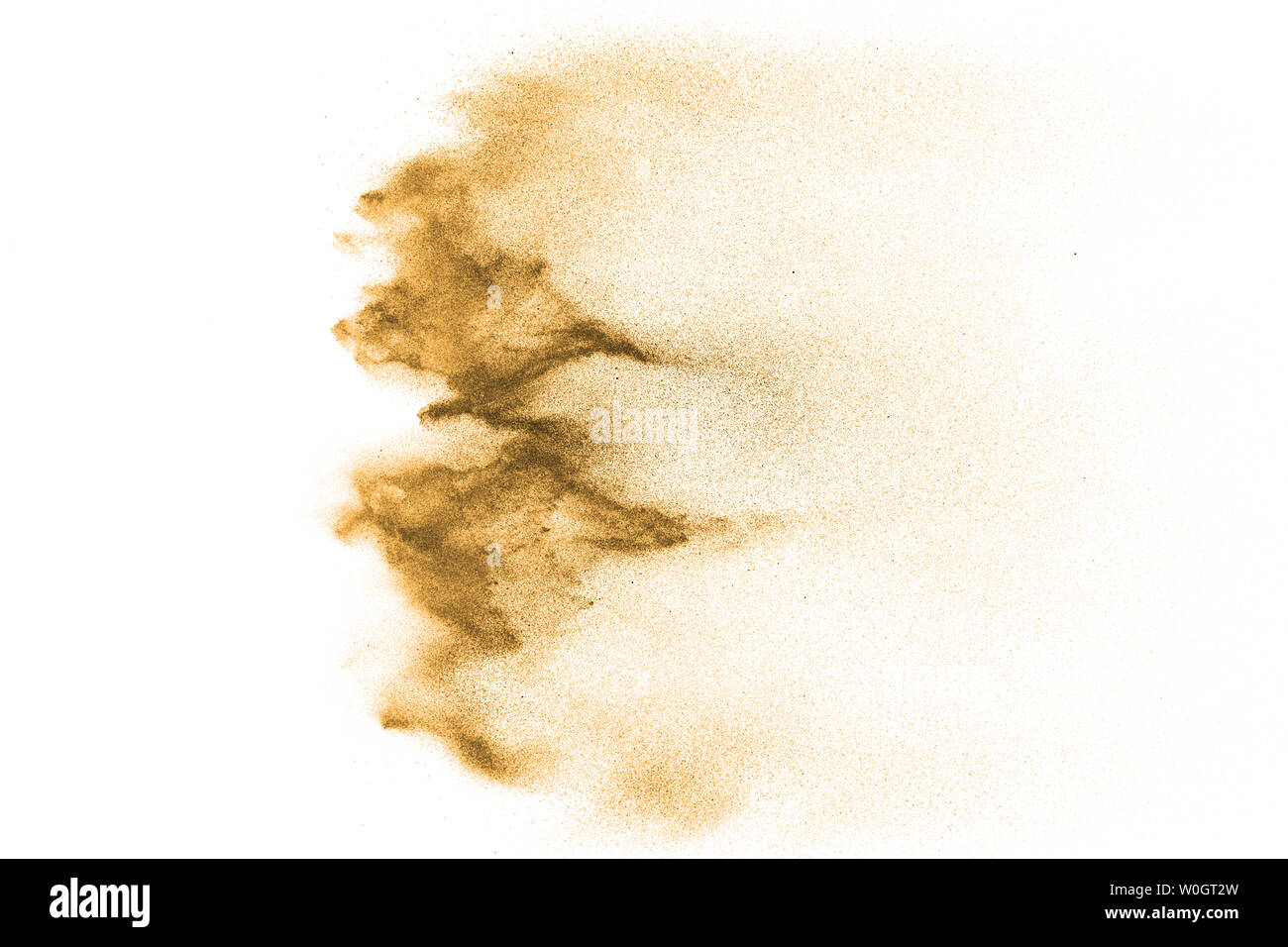 Golden sand explosion isolated on white background. Abstract sand ...