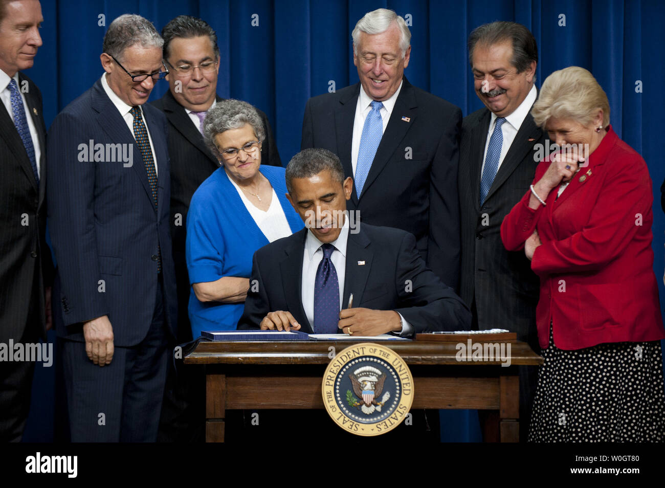 President Barack Obama signs the reauthorization of the Export-Import ...