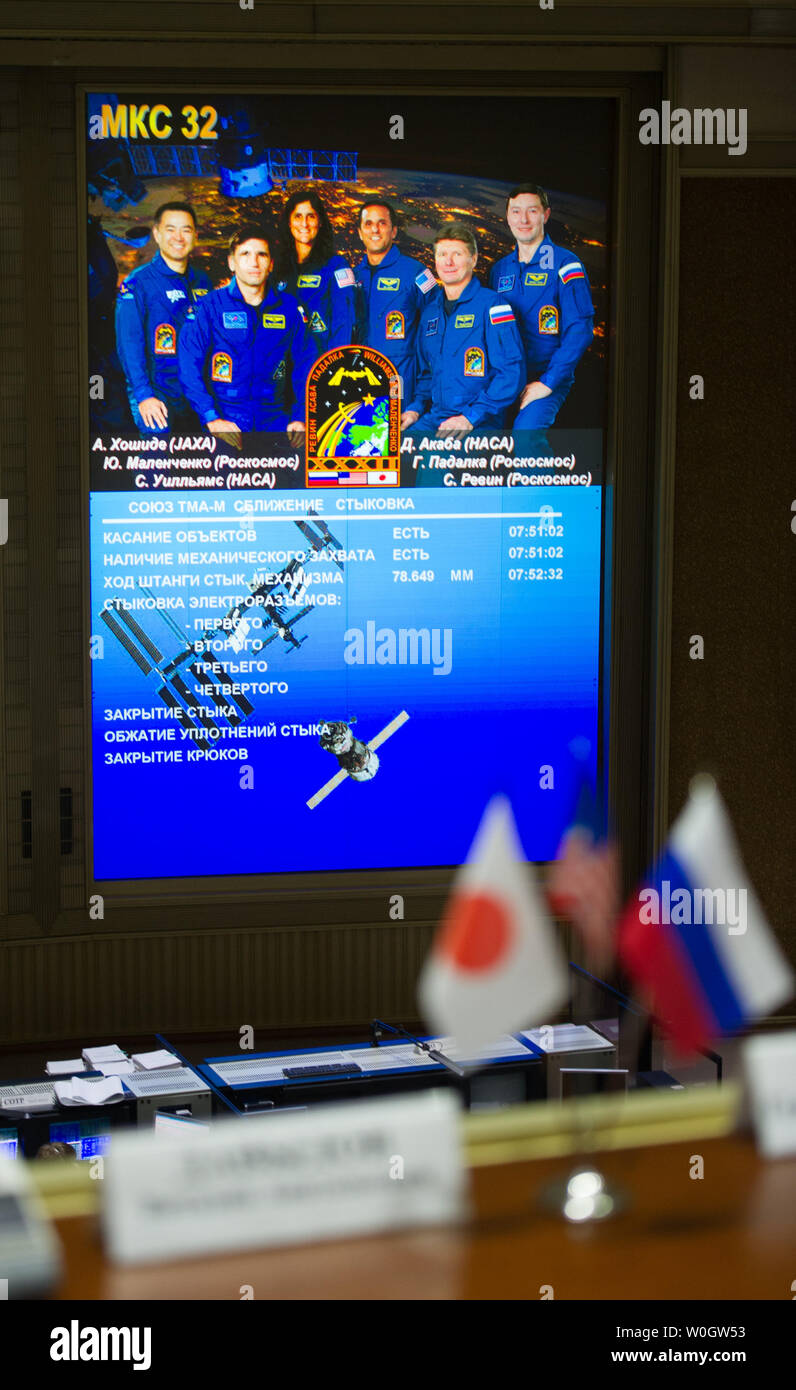A television screen at the Russian Mission Control Center in Korolev ...