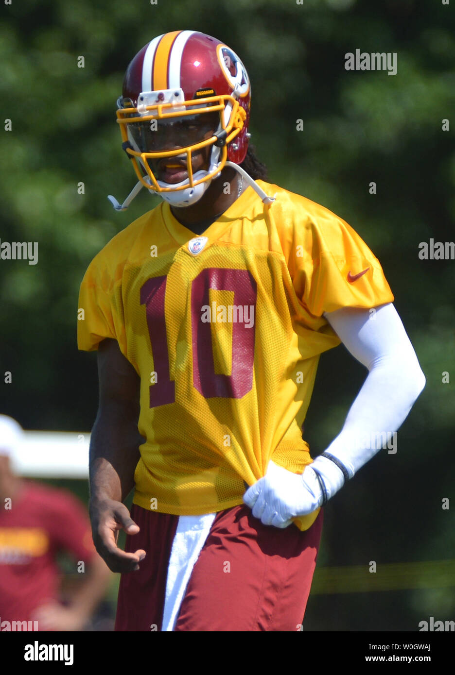 Washington Redskins quarterback Robert Griffin III takes part in ...