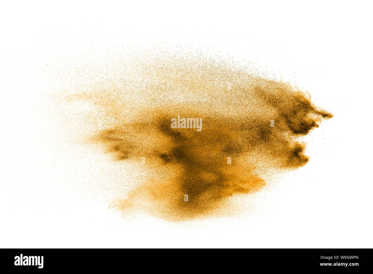 Golden sand explosion isolated on white background. Abstract sand ...