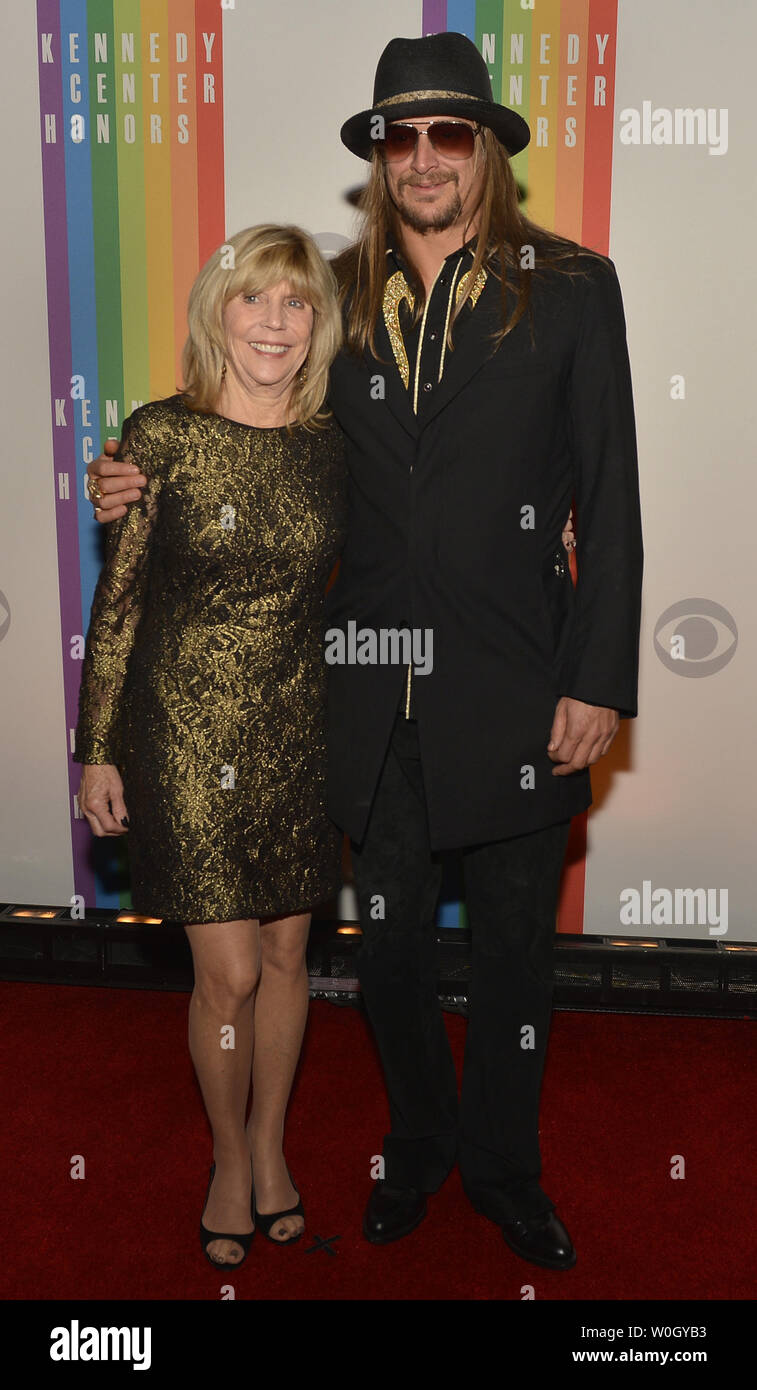 Musician Kid Rock and his mother Susan Ritchie pose for photographers ...