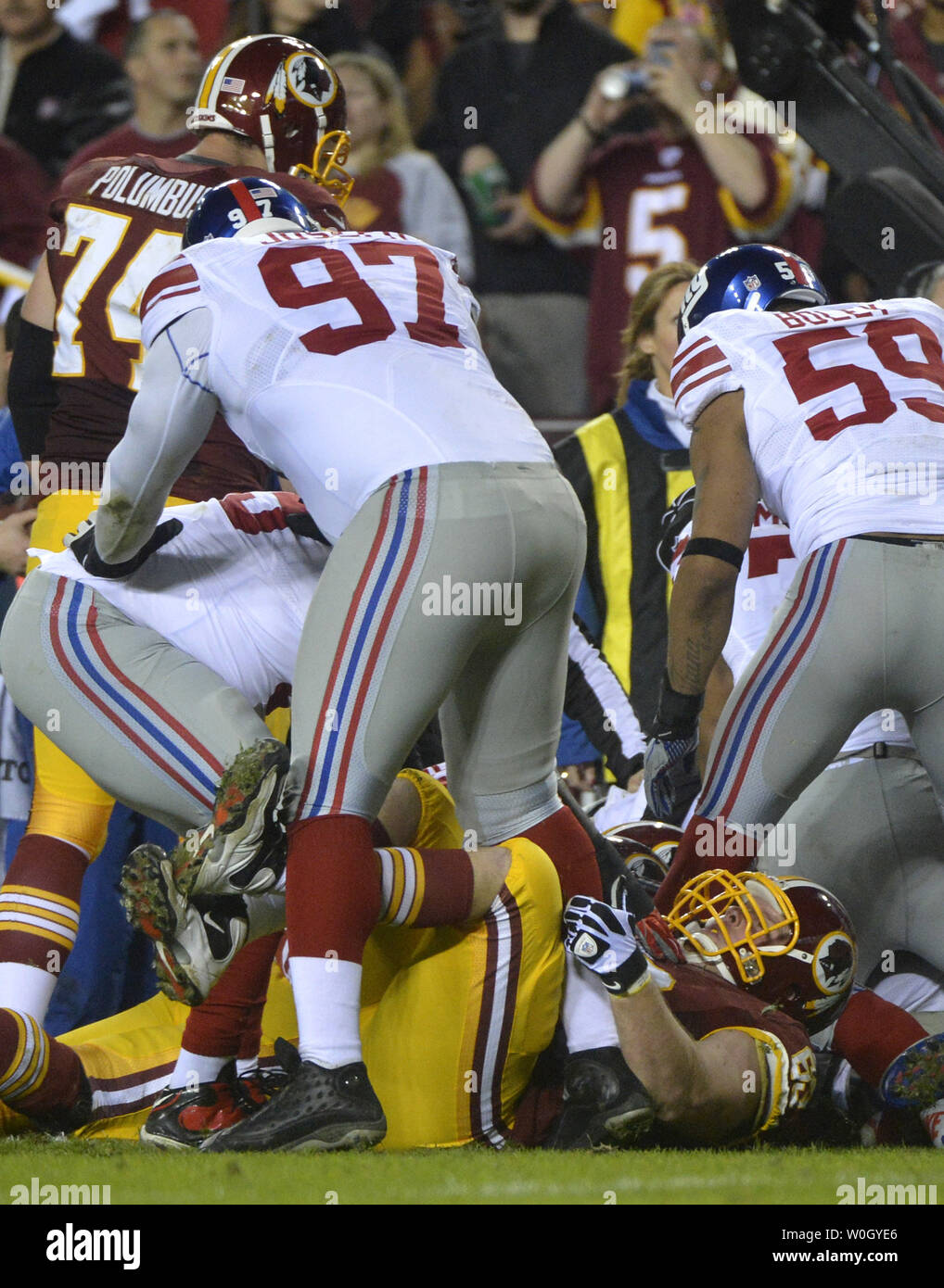 New York Giants Linval Joseph (97) stomps on Washington Redskins Will ...
