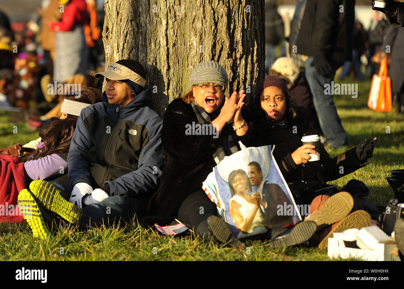 Gerald Proctor (L-R), Cathy Burgin and Charlene Burgin-Wren wait under ...