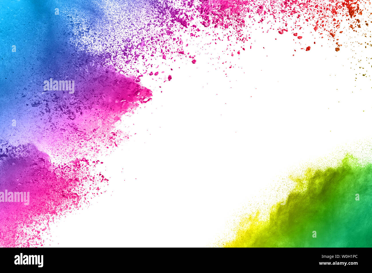 Multi color powder explosion on white background Stock Photo - Alamy
