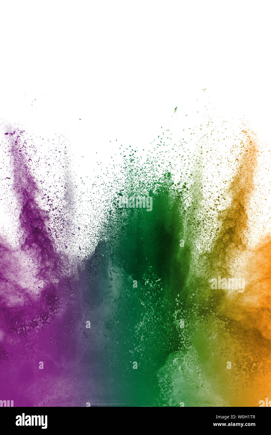 Multi color powder explosion on white background Stock Photo - Alamy