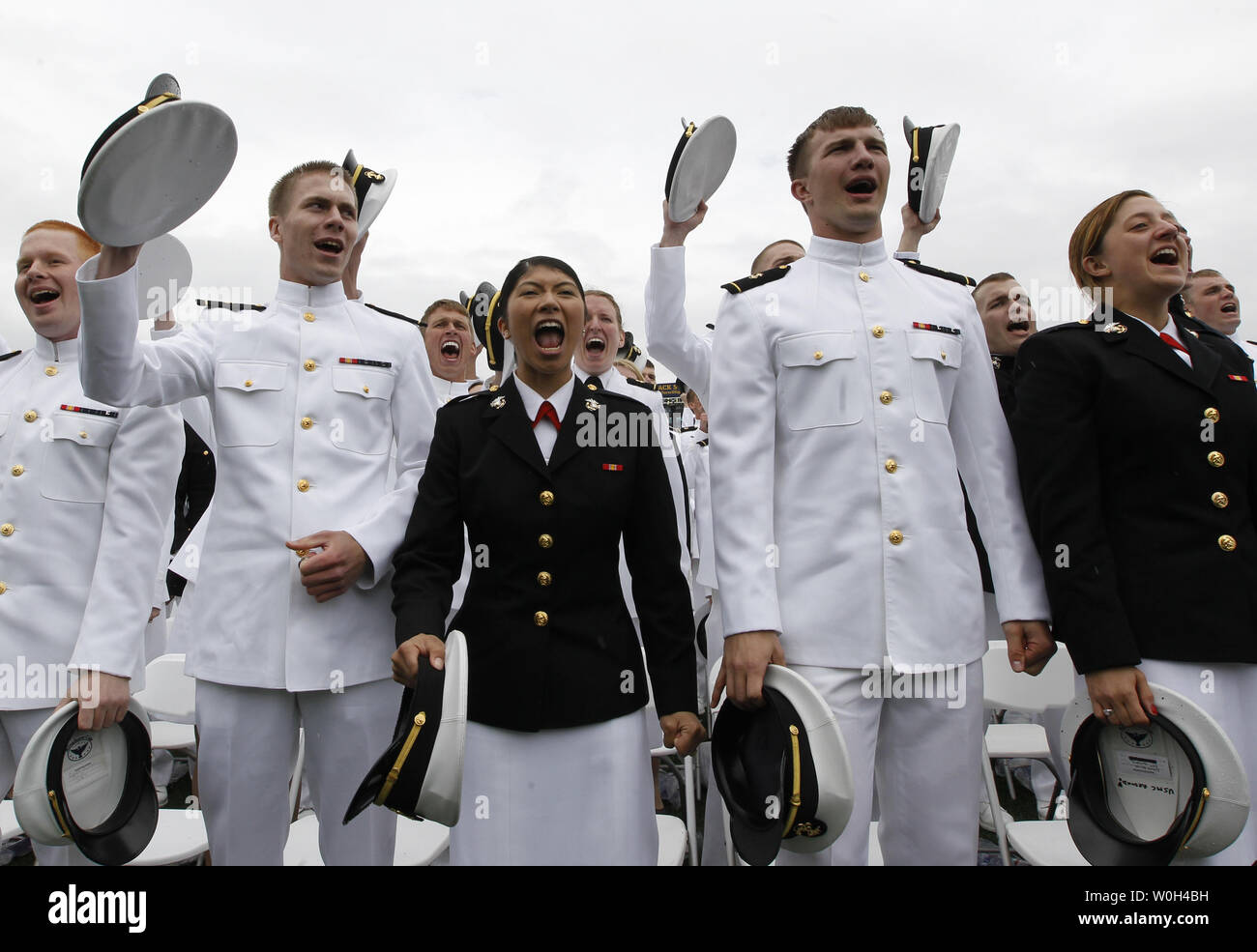 Midshipmen celebrate at the end of the U.S. Naval Academy Graduation ...