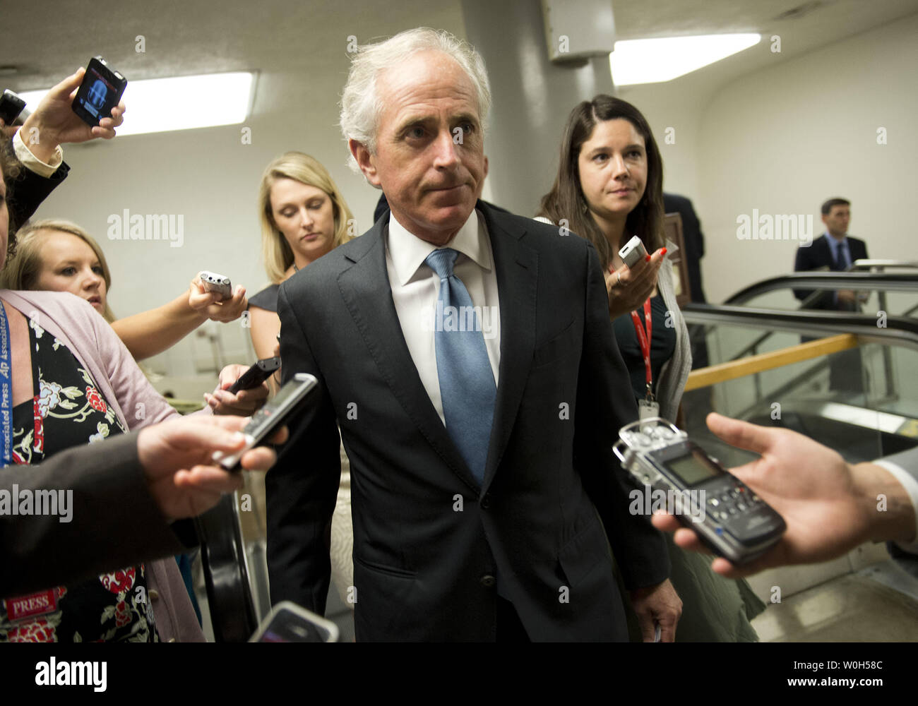 Sen. Bob Corker (R-TN) talks to reporters as he walks to the Senate ...