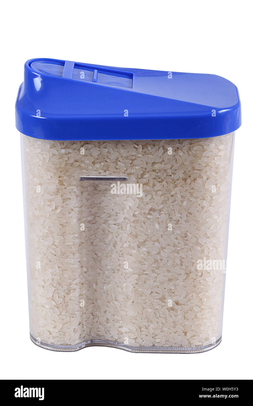 White rice in a plastic container Stock Photo - Alamy