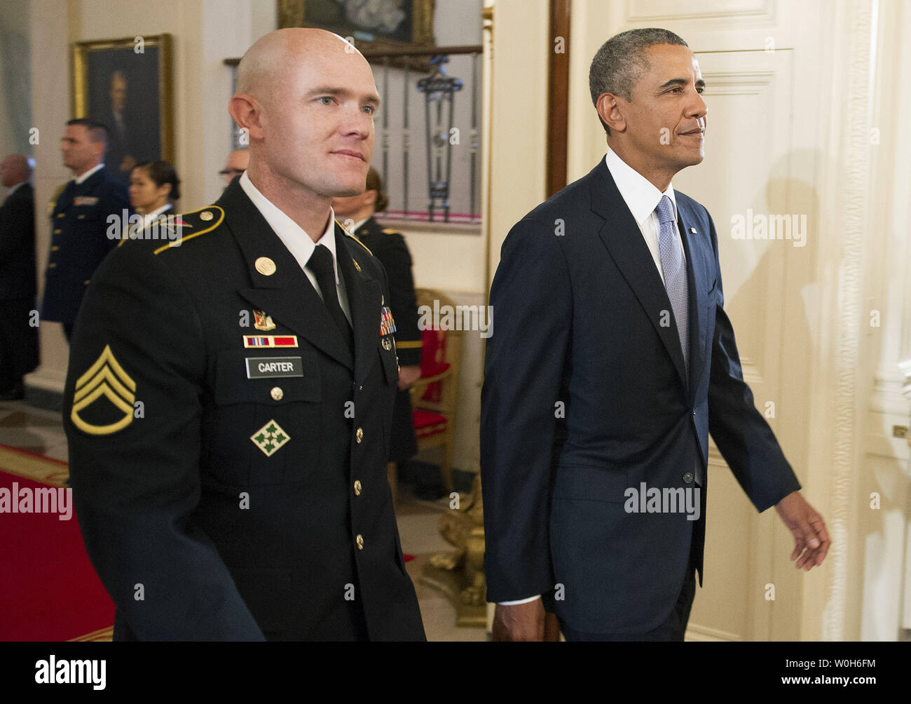 President Barack Obama and U.S. Army Staff Sergeant Ty M Carter arrive ...