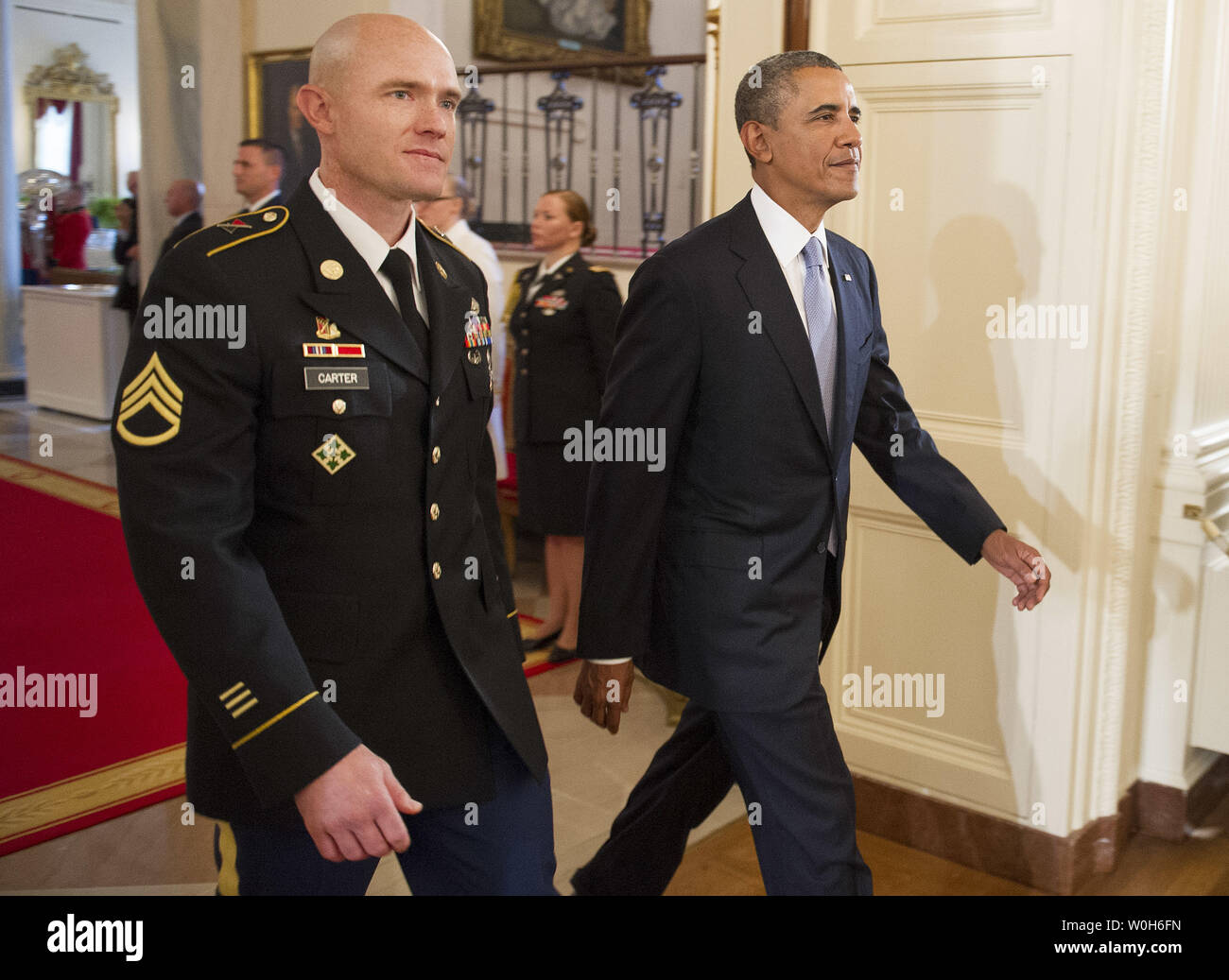 President Barack Obama and U.S. Army Staff Sergeant Ty M Carter arrive ...