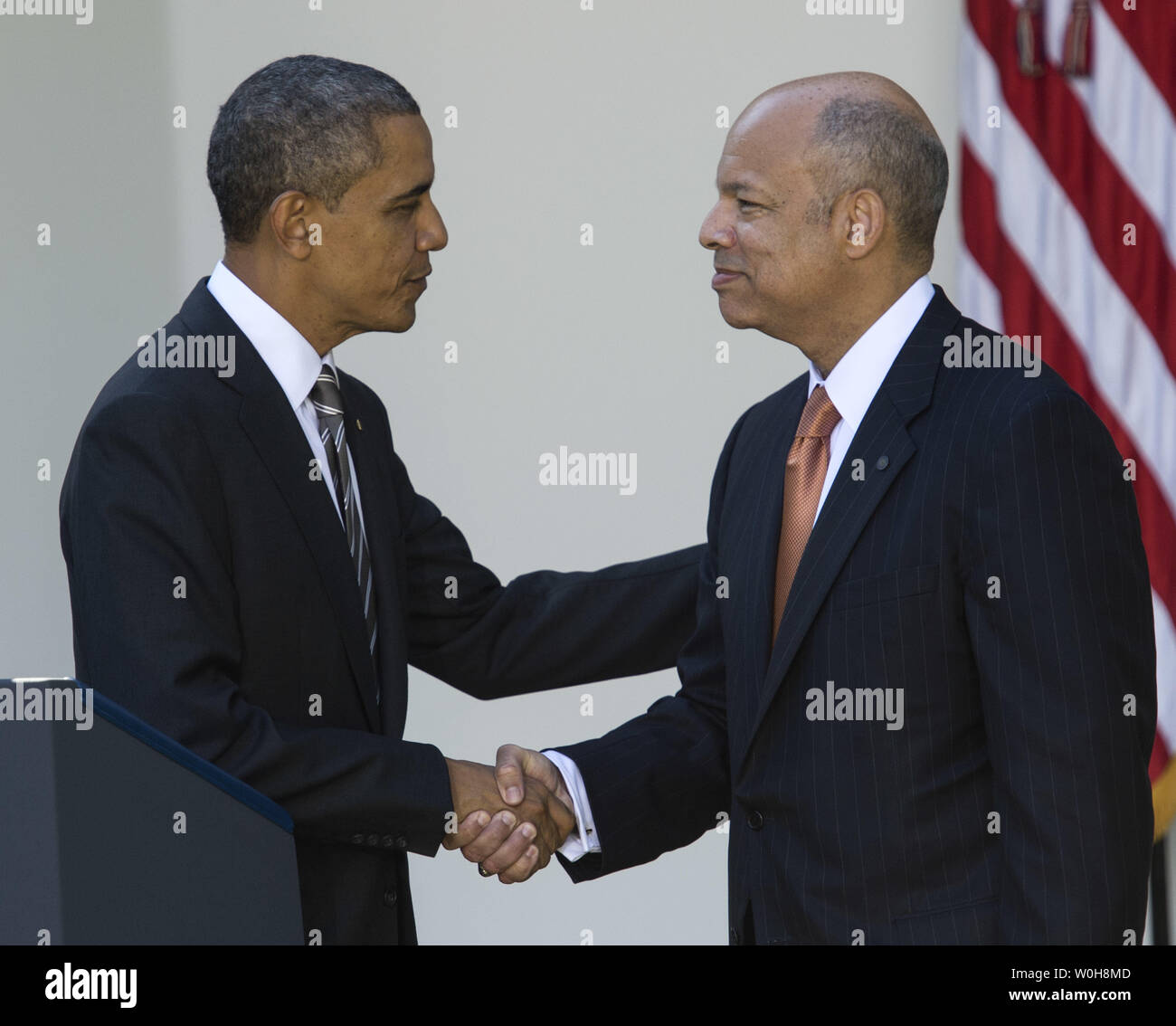 U.S. President Barack Obama shakes hands with Jeh Johnson (R) after he ...