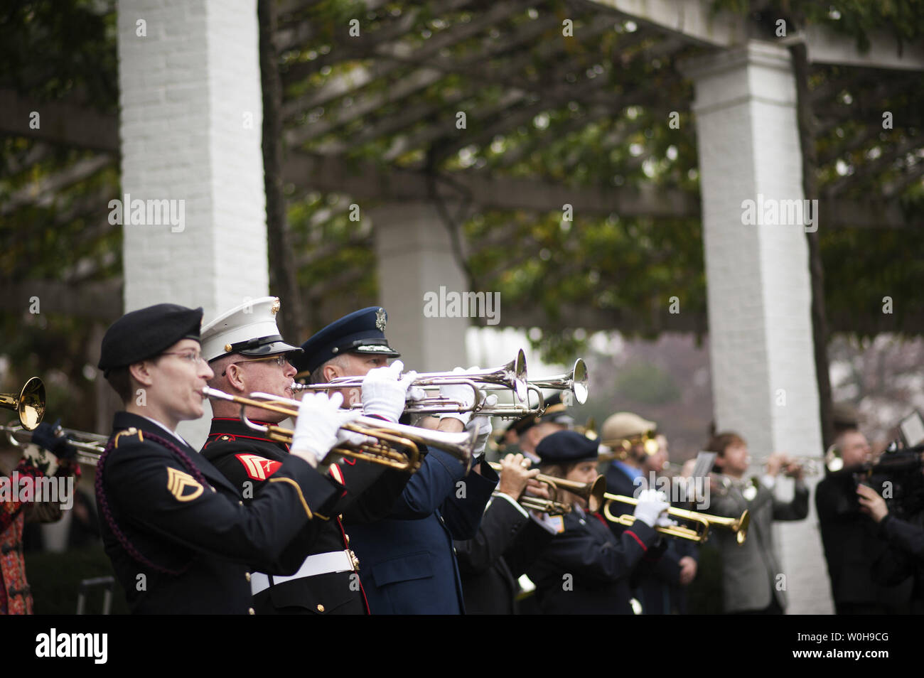 Buglers play Taps during the Bugle Call to Remember in honor of the the ...