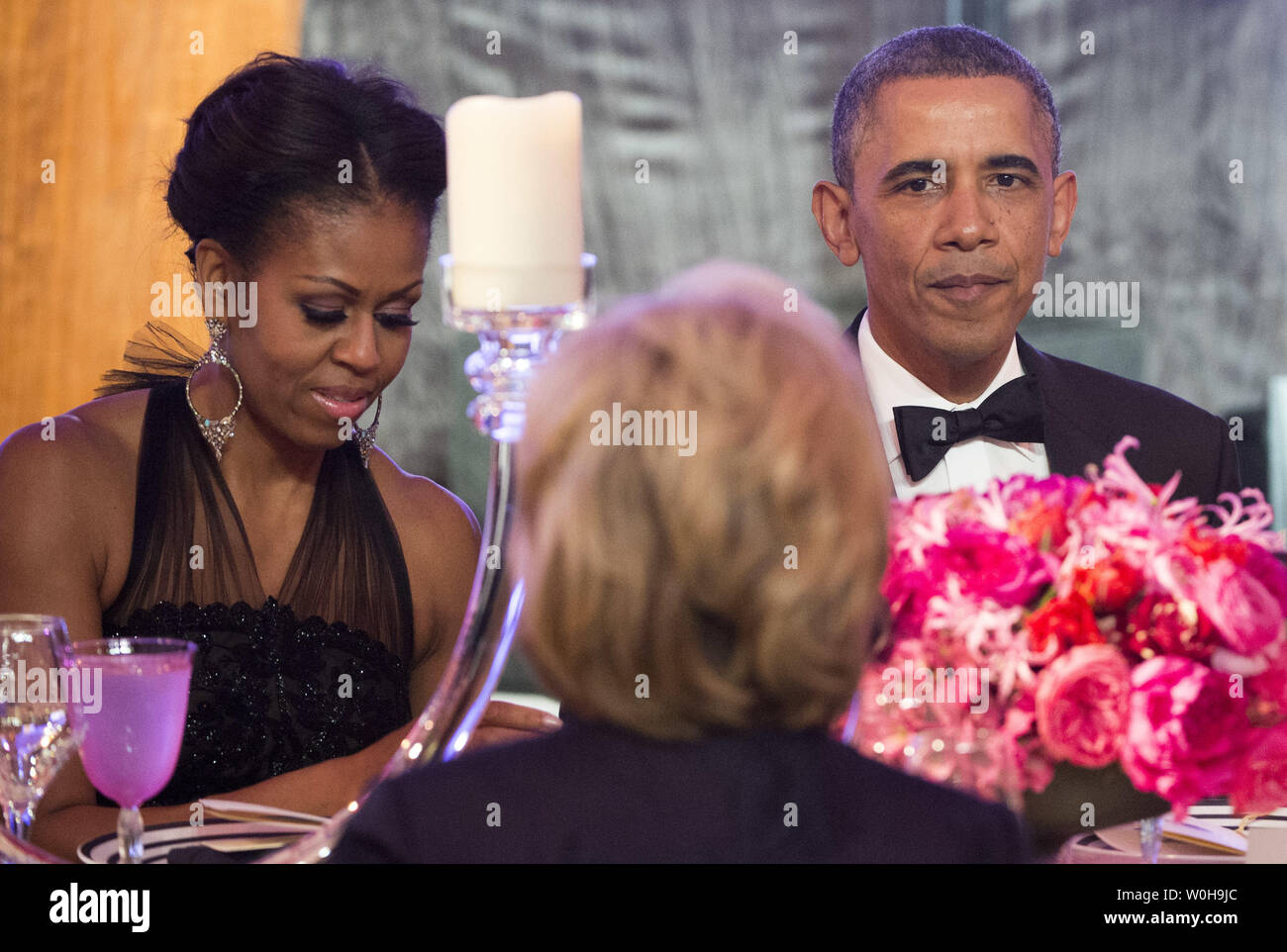 President Barack Obama and First Lady Michelle Obama eat dinner with ...