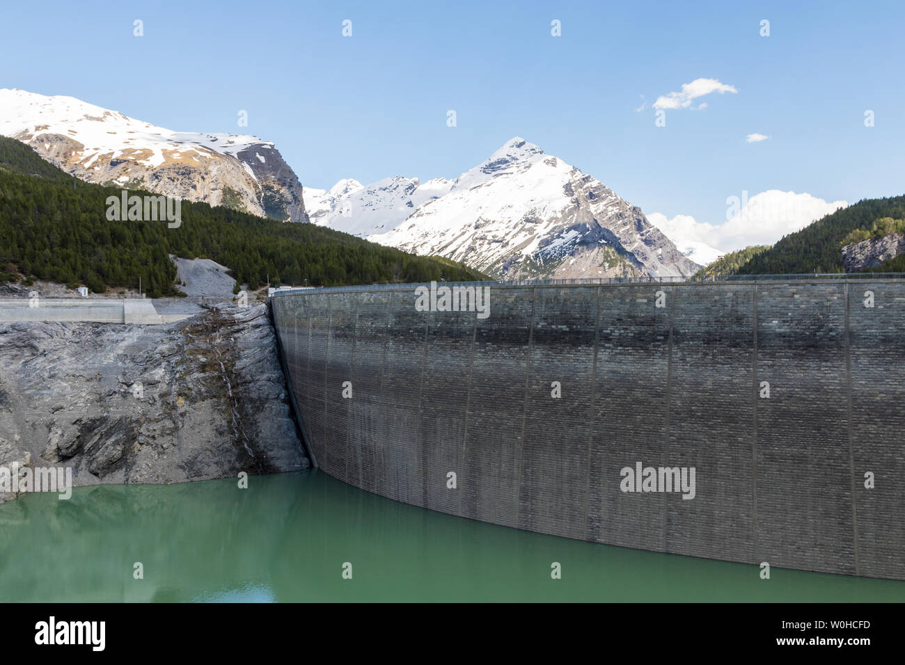 Alpine landscape with artificial lake, italy Stock Photo - Alamy