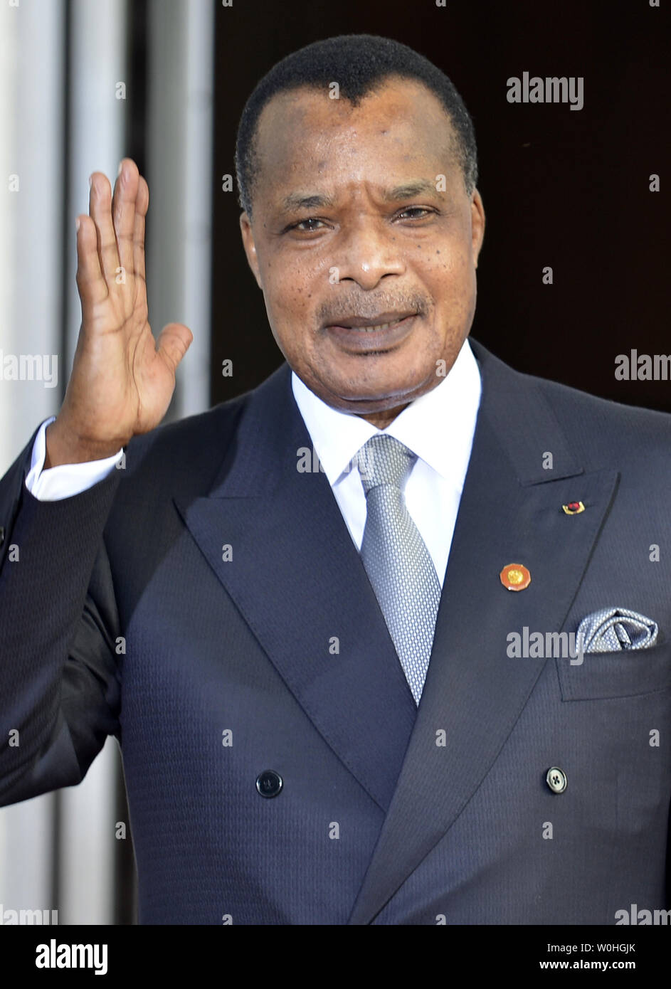 Republic of Congo's President Denis Sassou N'Guesso greets the press as ...