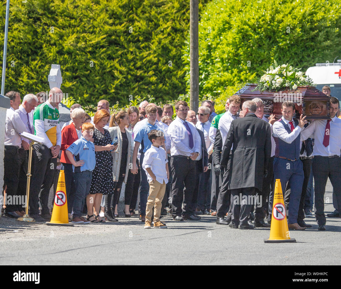 The coffin of rally driver Manus Kelly is taken from St Columba's ...