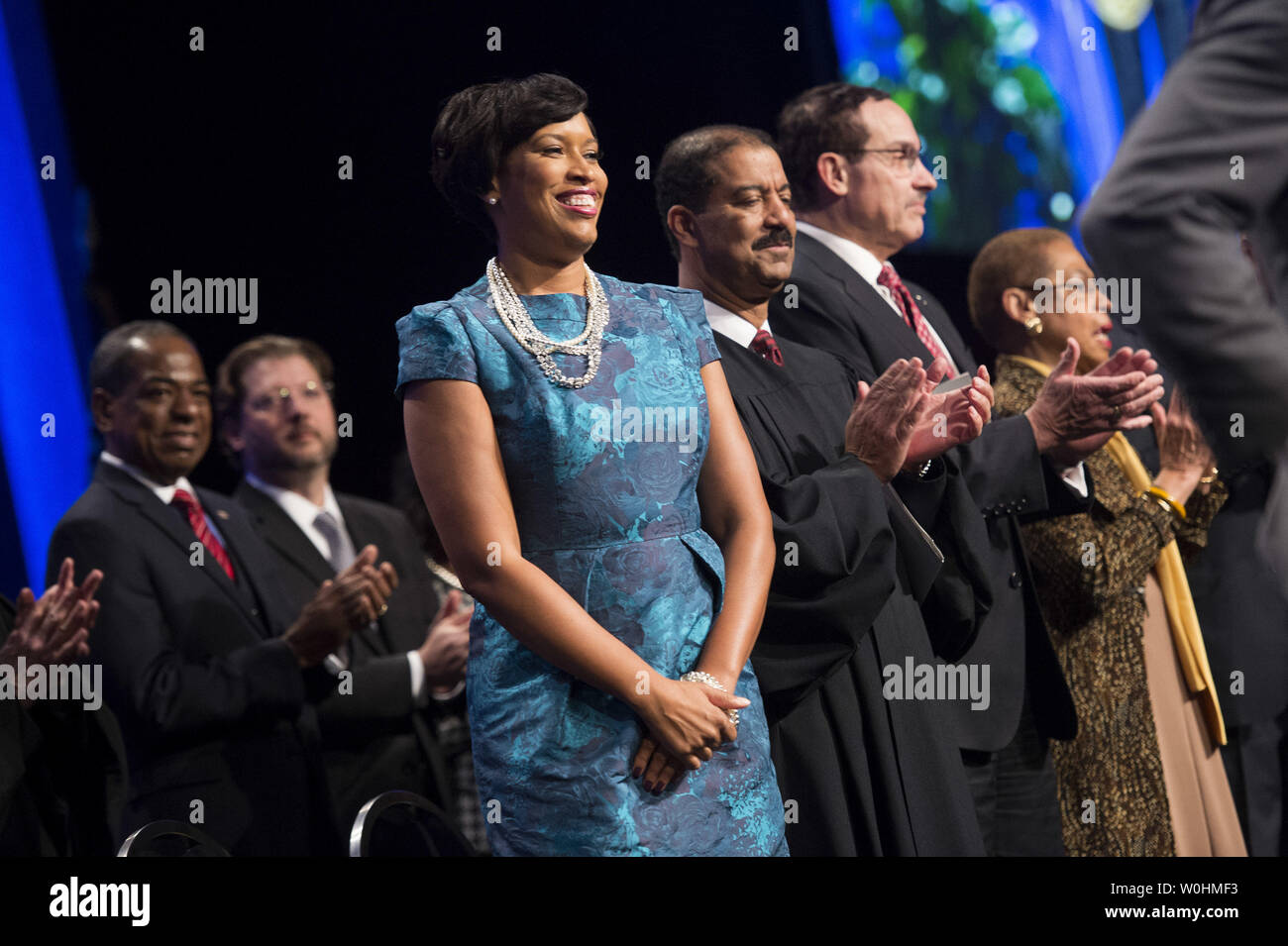Newly sworn-in Washington, D.C. Mayor Muriel Bowser is seen on stage ...