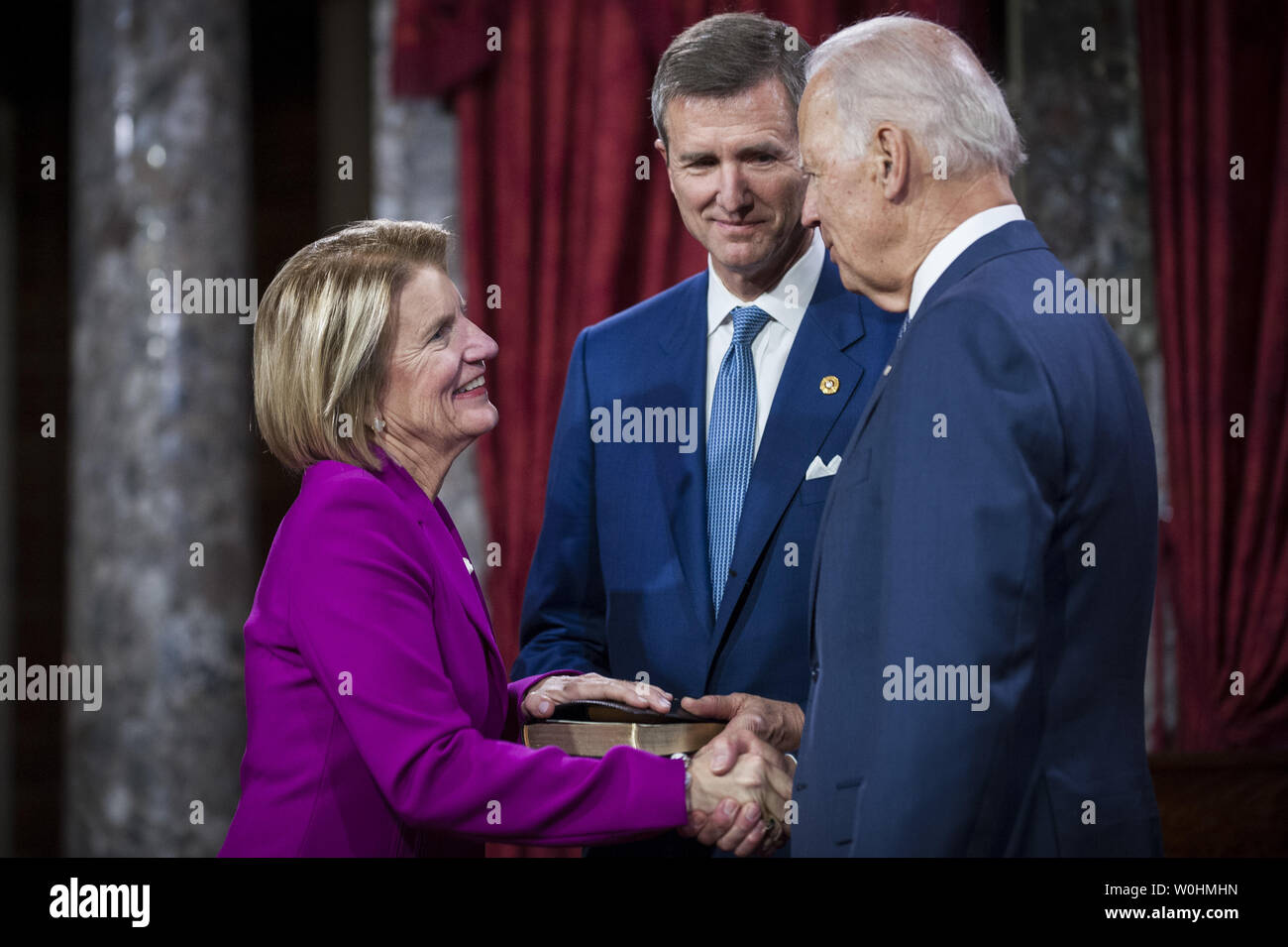 Vice President Joe Biden (right) administers the Senate oath to Senator ...