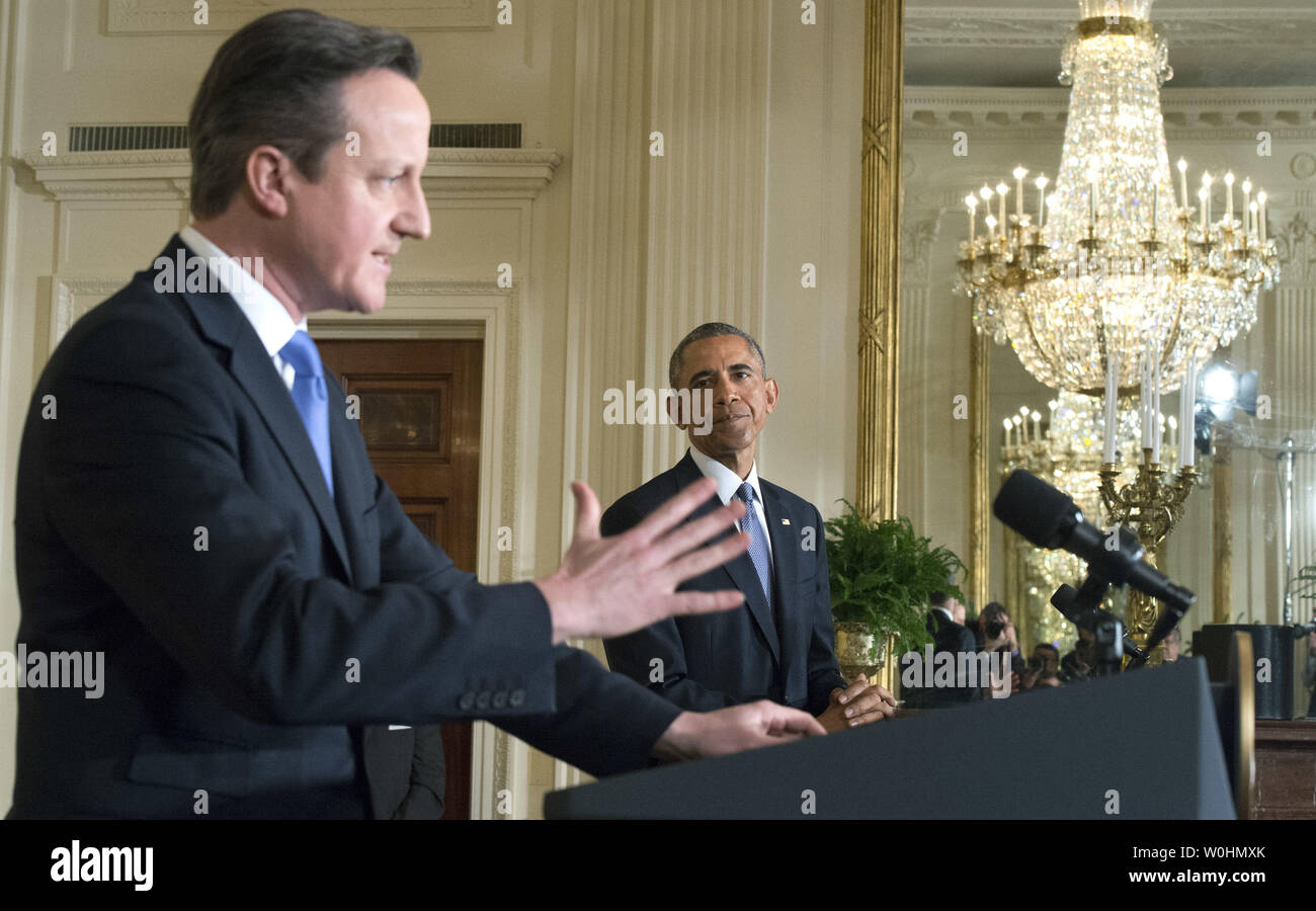 President Barack Obama (R) and British Prime Minister David Cameron ...