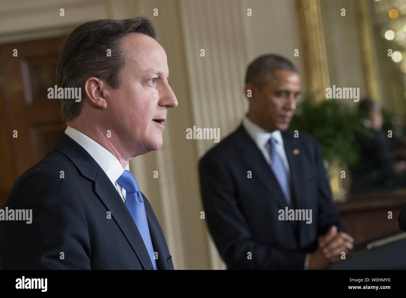 President Barack Obama (R) and British Prime Minister David Cameron ...