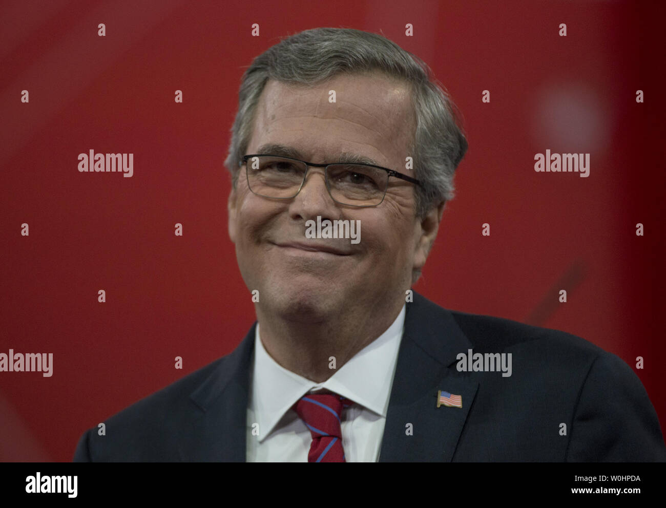 Former Florida Gov. Jeb Bush smiles while speaking at the Conservative ...