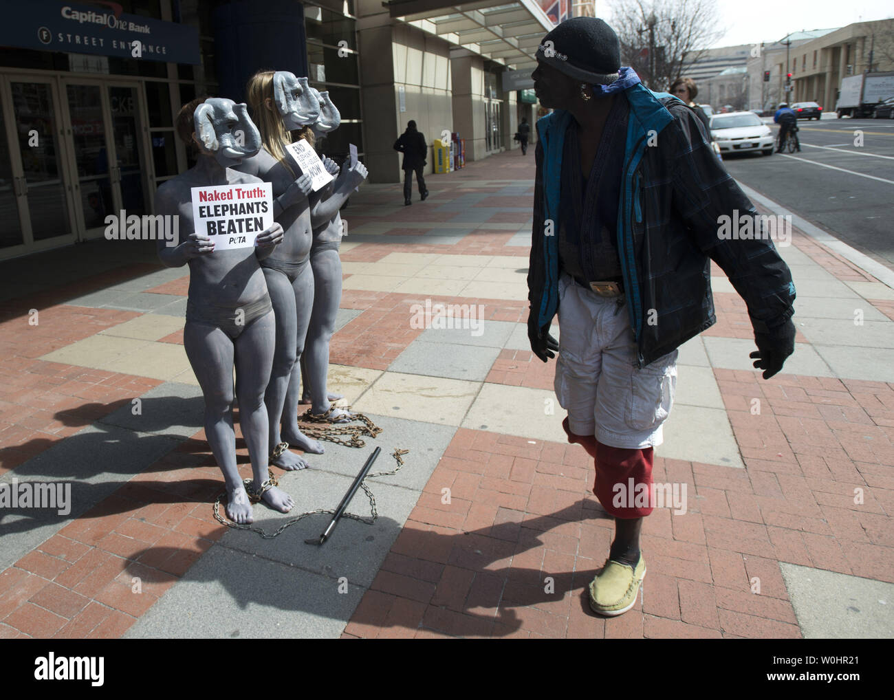 A man interacts with People for the Ethical Treatment of Animals (PETA ...