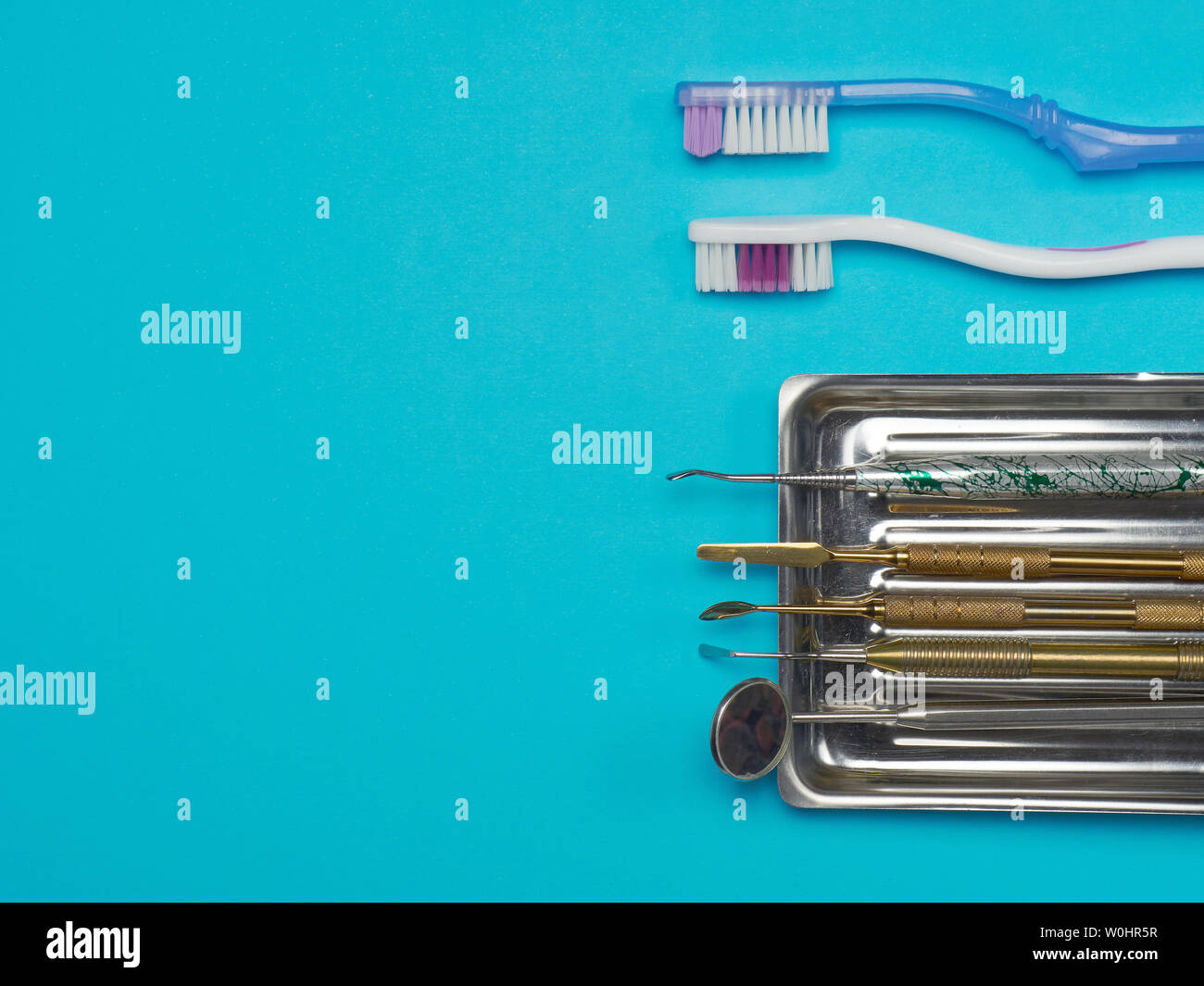 Professional dental tools on blue background. Dental health concept ...