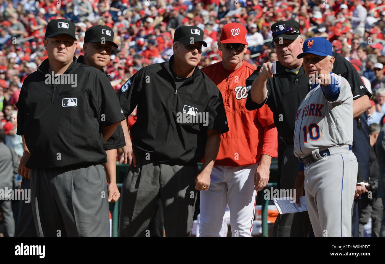 Plate Umpire Tim Welke points out something to New York Mets Manager ...