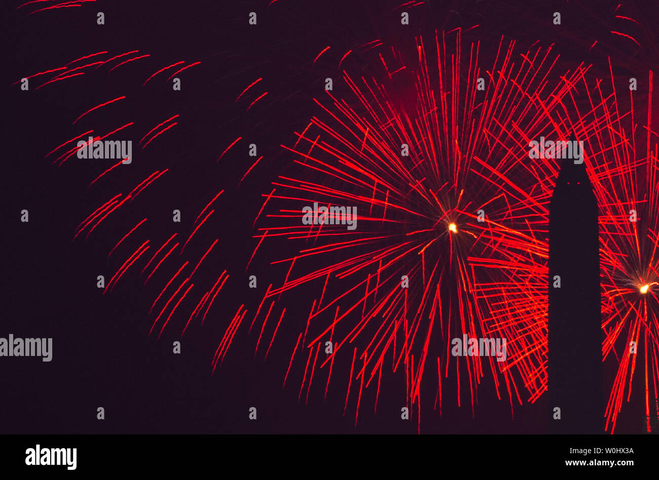 Fireworks explode over the National Mall in honor of Independence Day ...