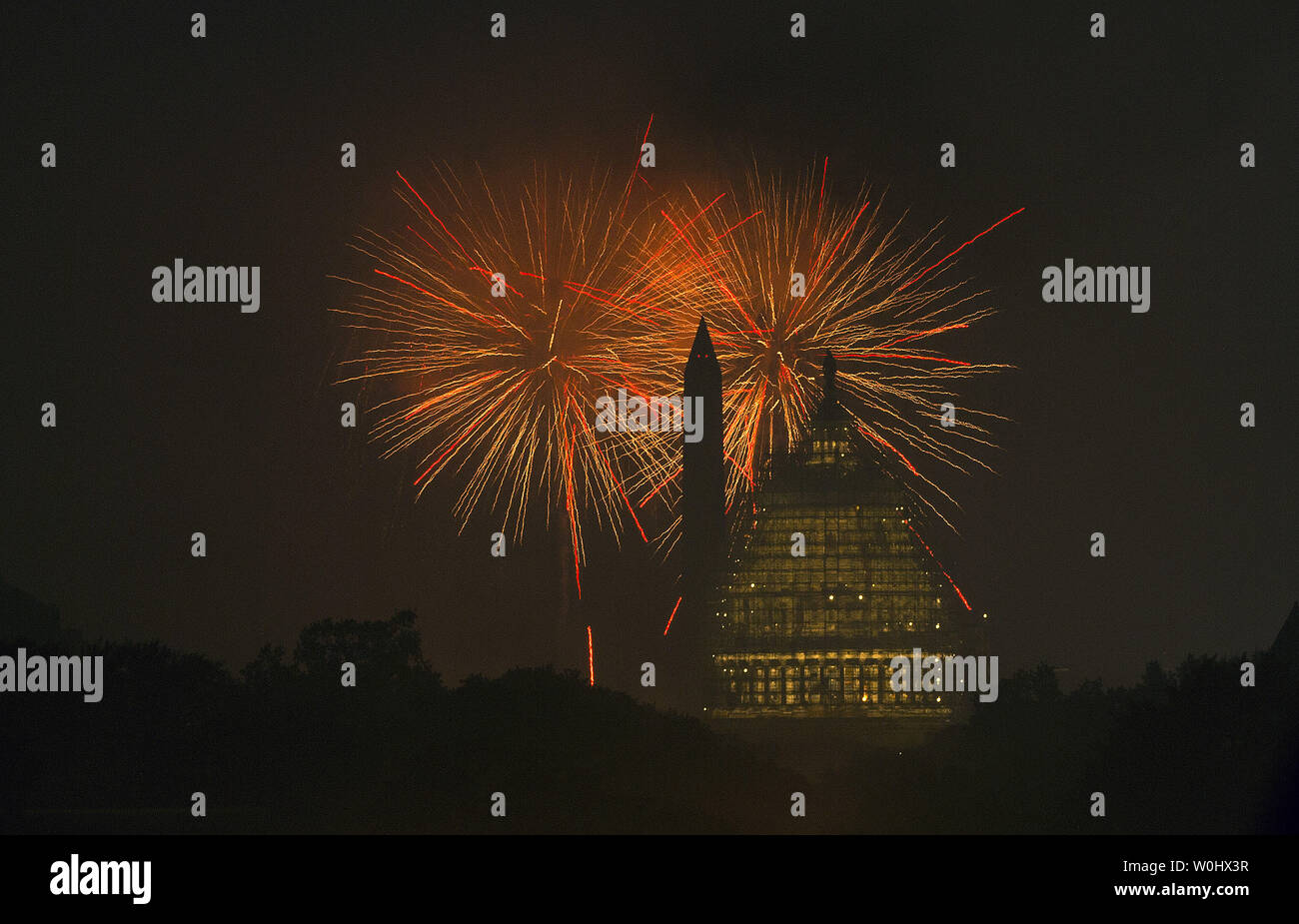 Fireworks explode over the National Mall in honor of Independence Day ...