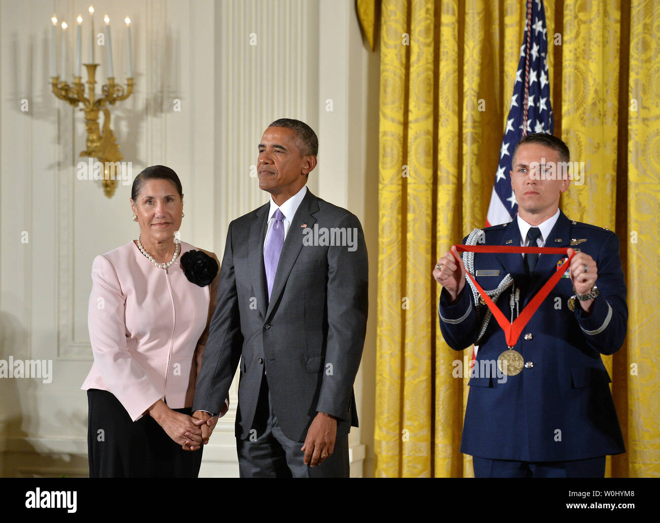 President Barack Obama awards a 2014 National Humanities Medal to ...
