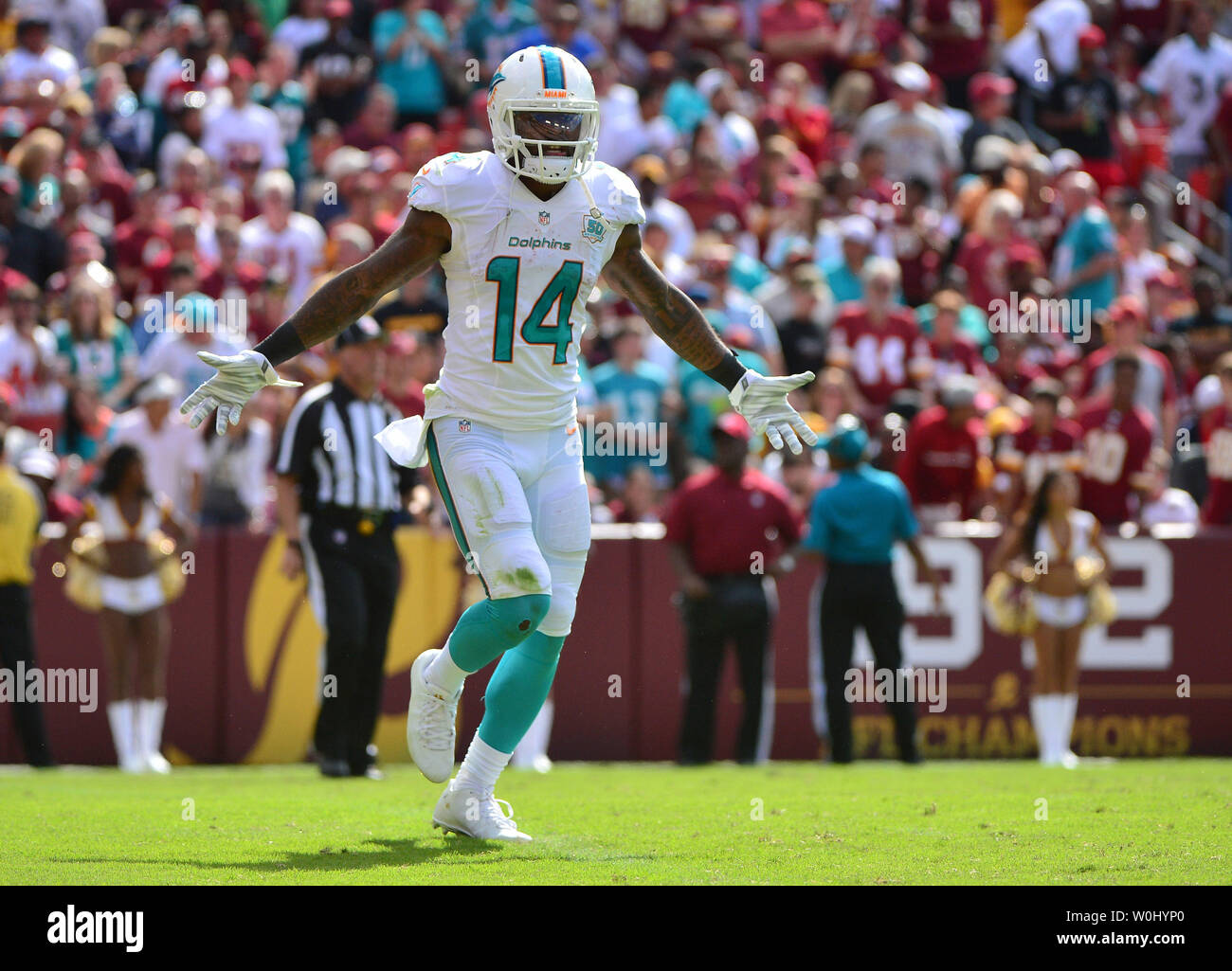Miami Dolphins Jarvis Landry celebrates after returning a punt for a 69 ...