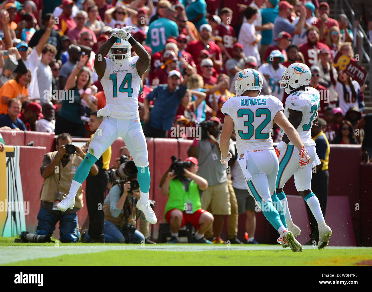 Miami Dolphins Jarvis Landry celebrates after returning a punt for a 69 ...